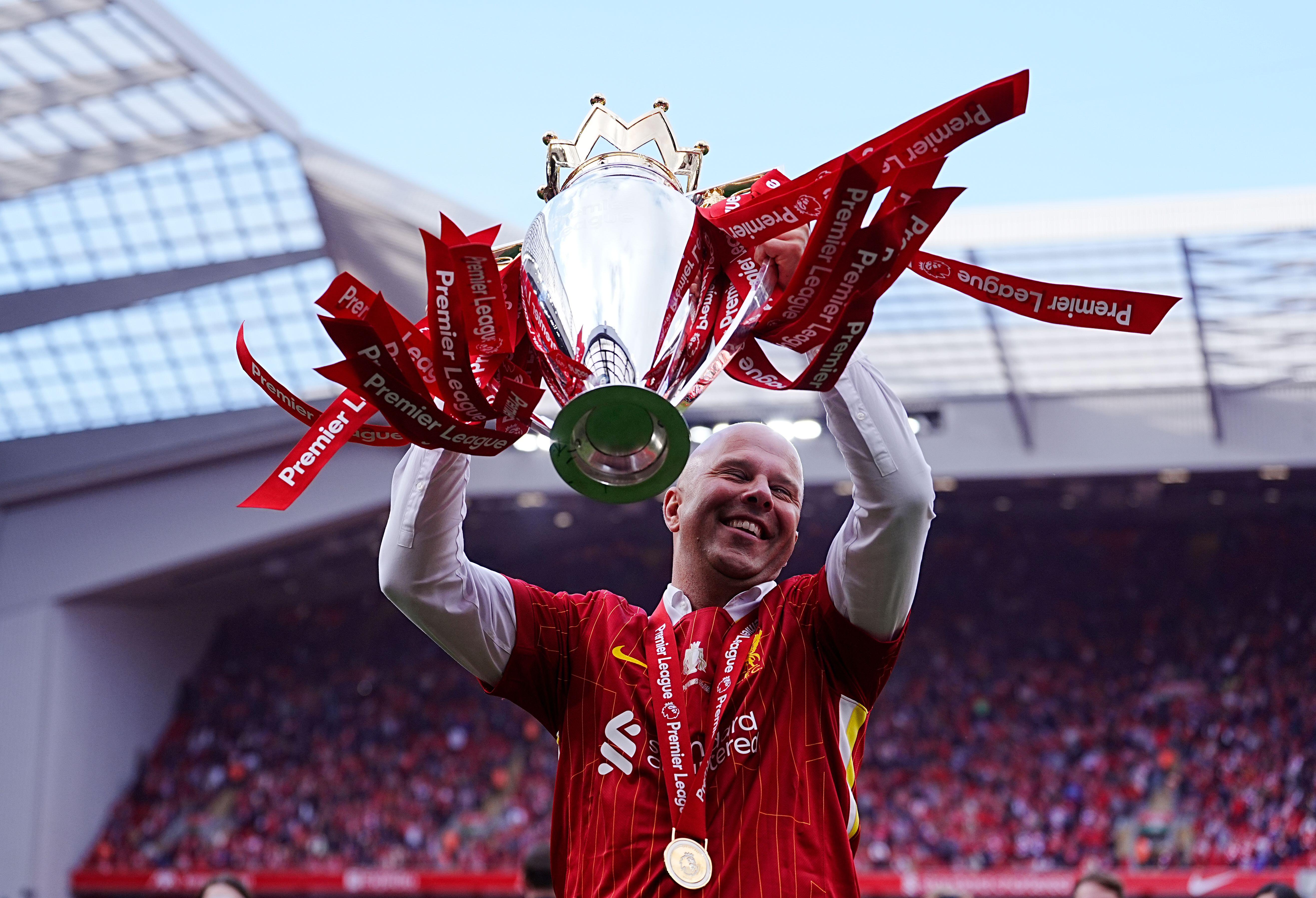 Liverpool lift Premier League trophy after final game ends level