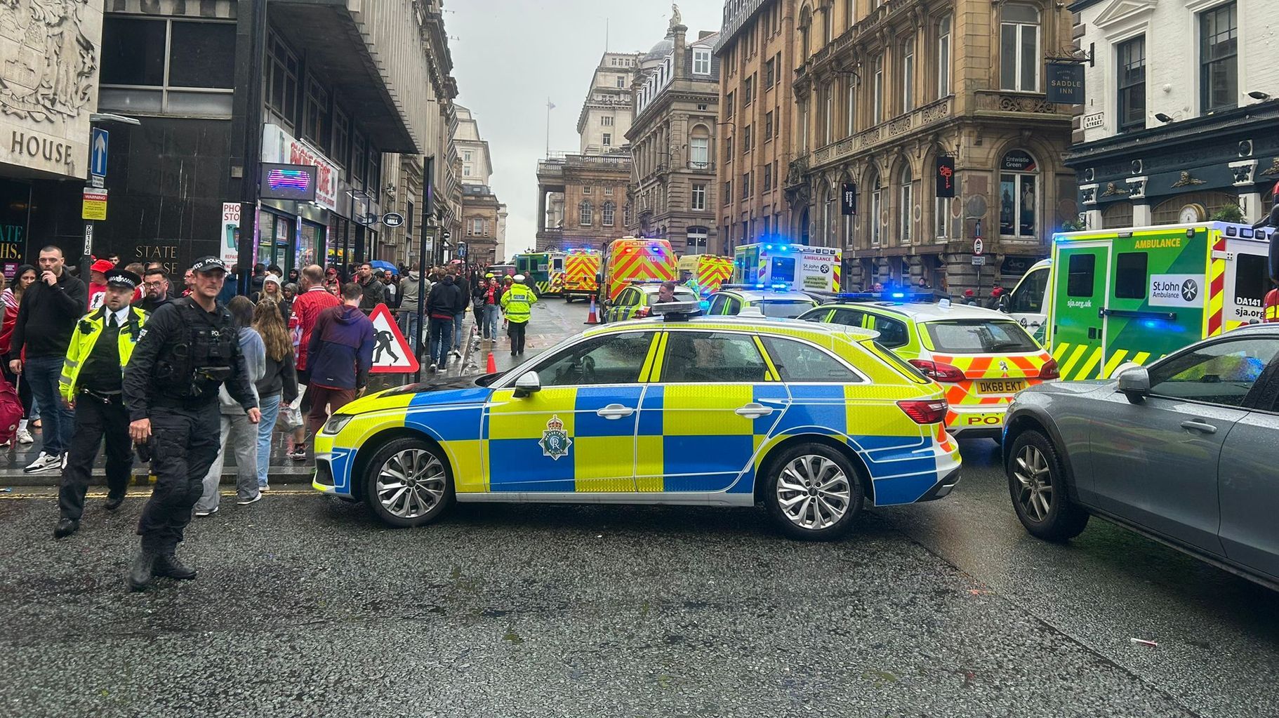 Witnesses describe 'terror' as car drove into crowd in Liverpool