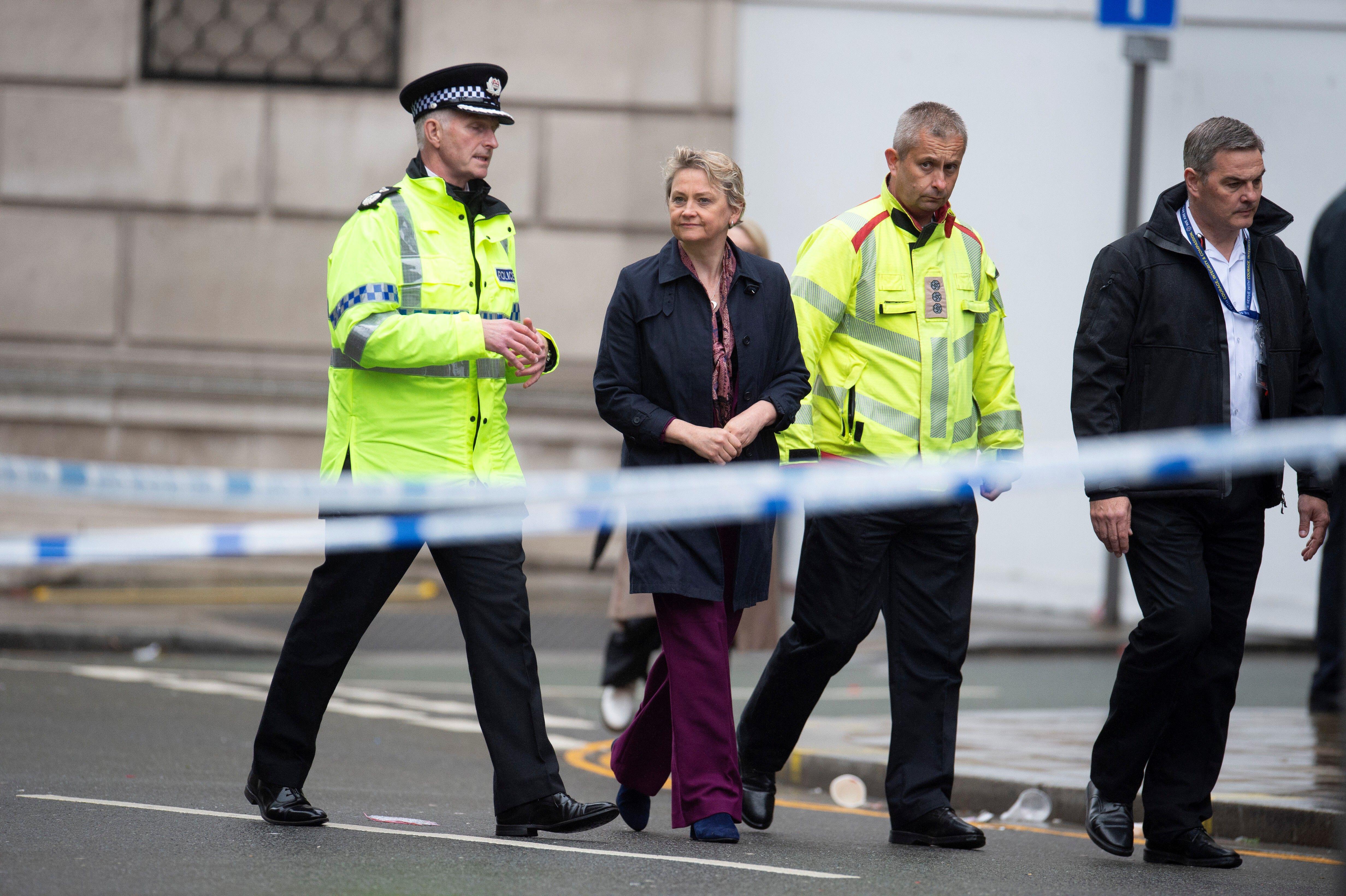 Home secretary visits scene of Liverpool parade crash