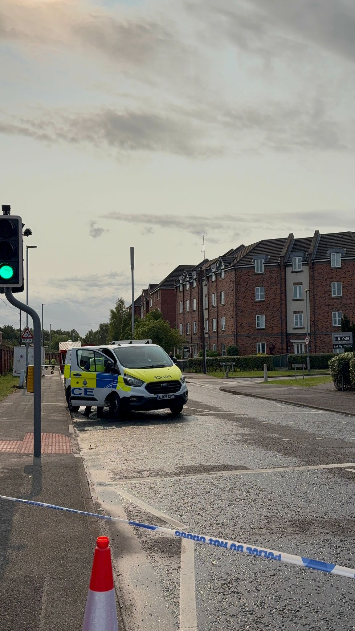 Child arrested after fire at block of flats in Warrington