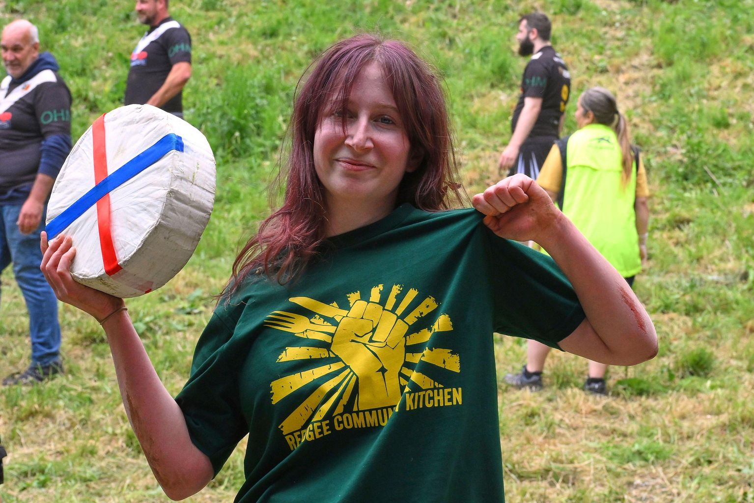 Winner of Gloucestershire cheese roll donates prize to food charity