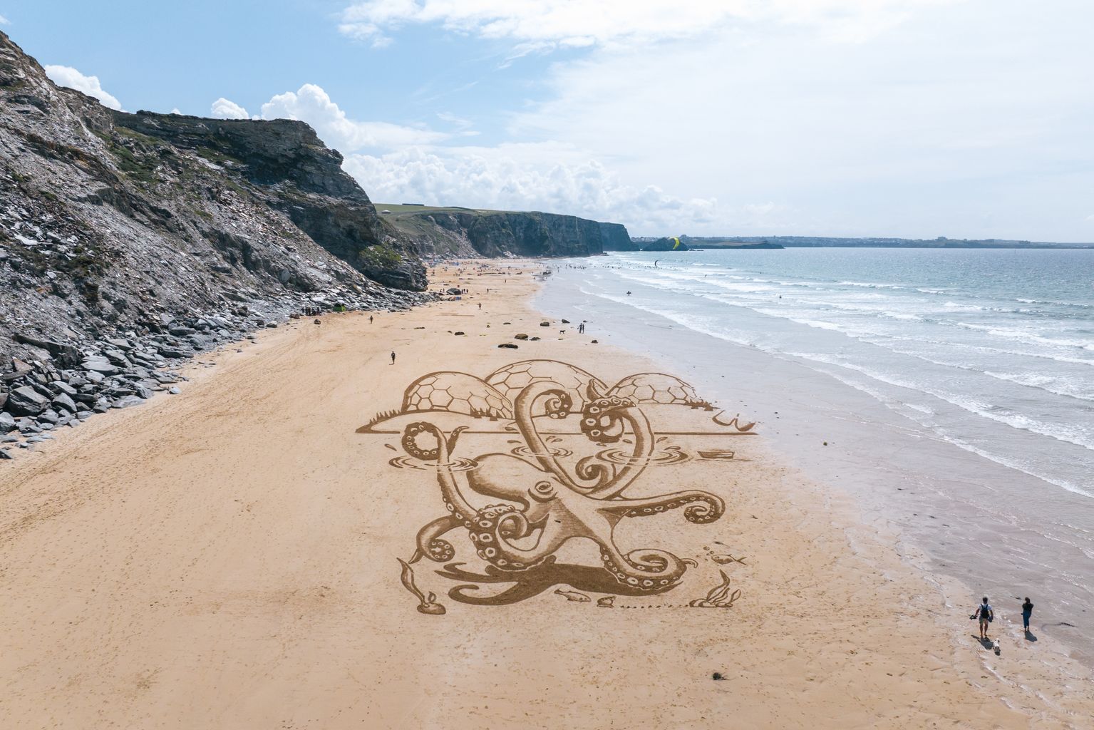 Huge sand artwork display on Watergate Bay beach