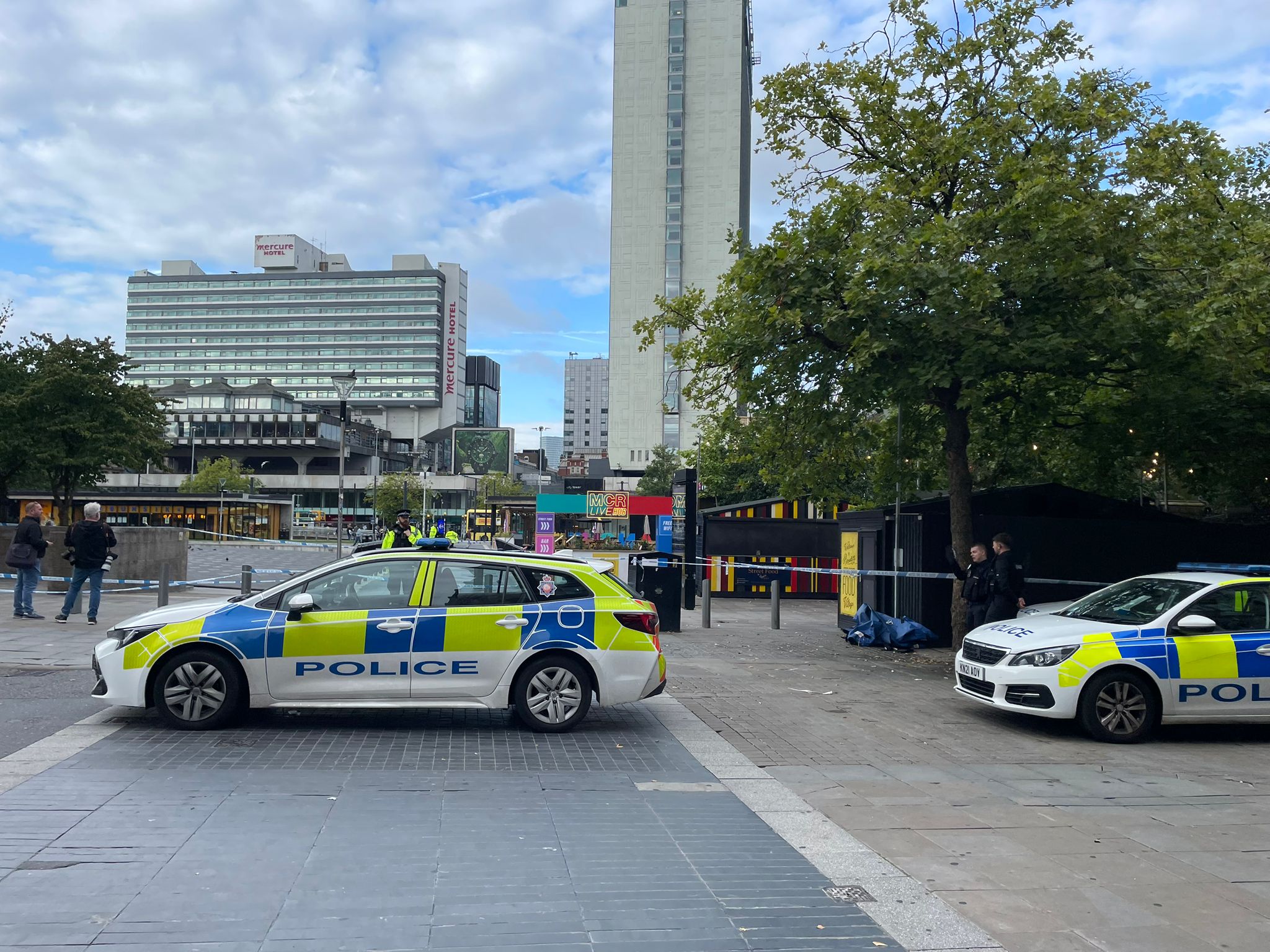 Police tape off Piccadilly Gardens following reports of stabbing