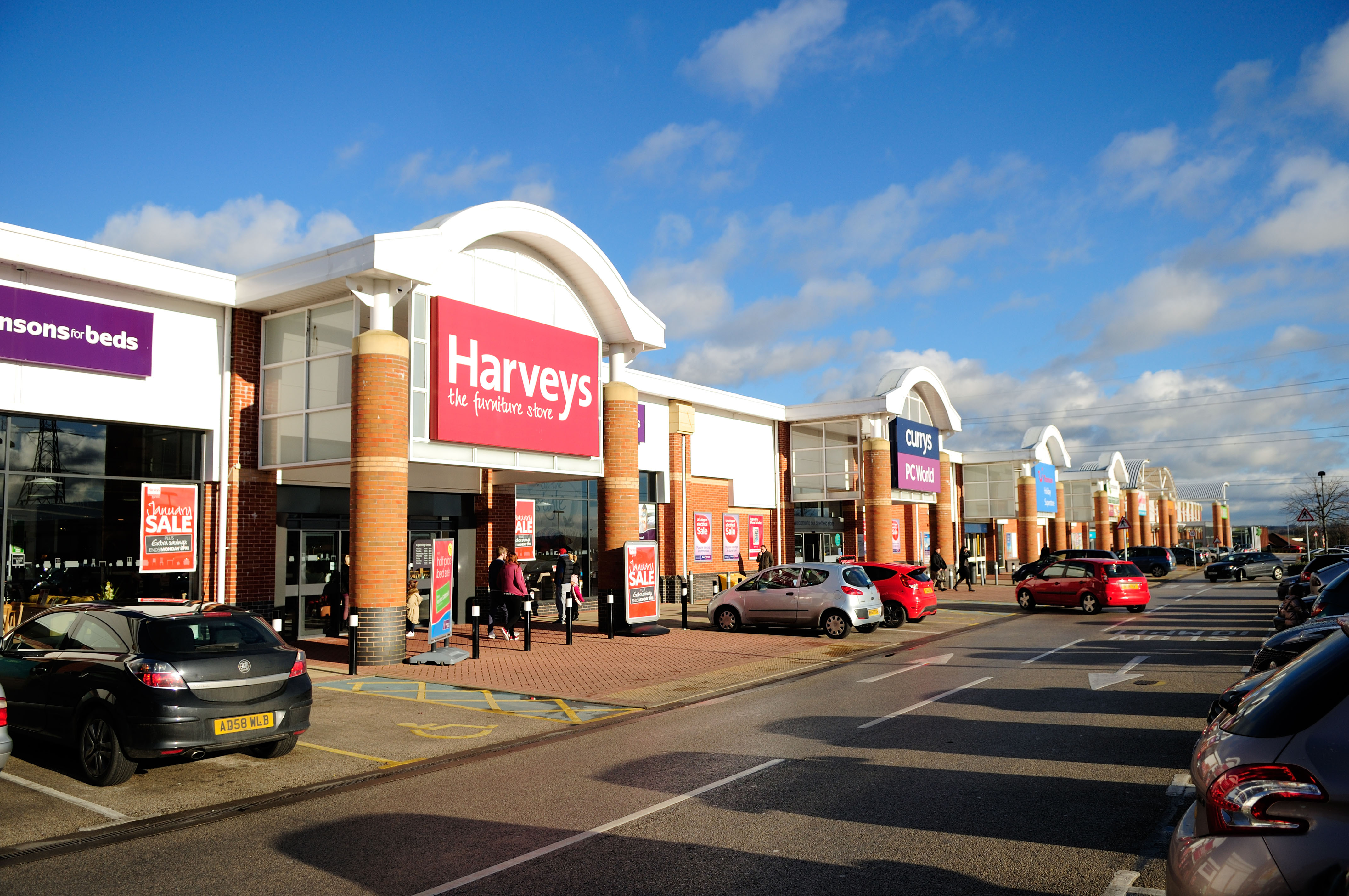 Two people escape serious injury after car ends up on steep embankment ...