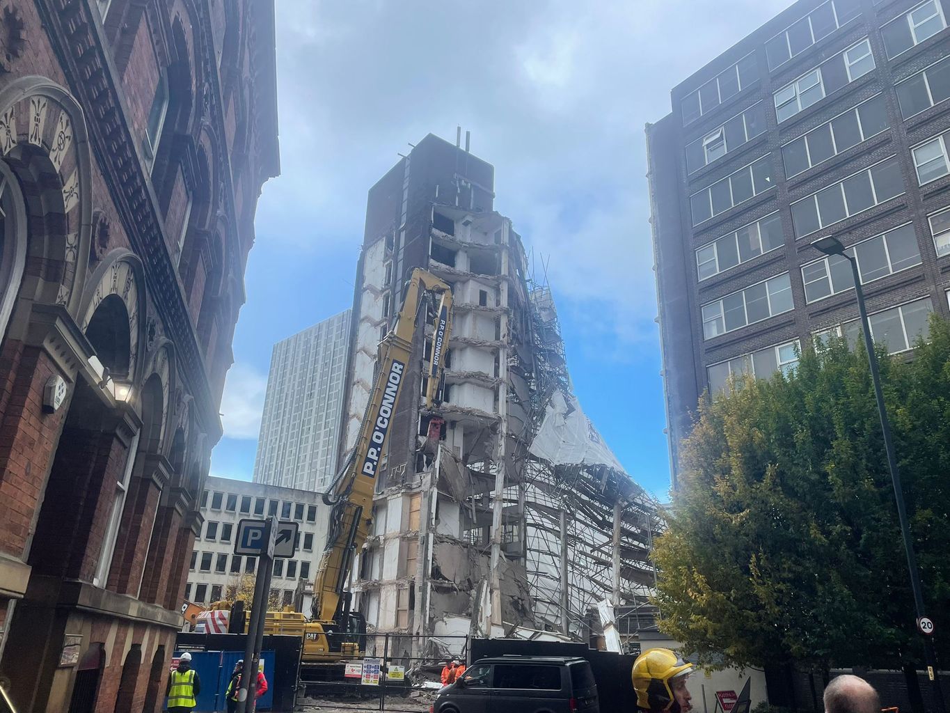 Firefighters at scene of Manchester demolition site after scaffolding ...