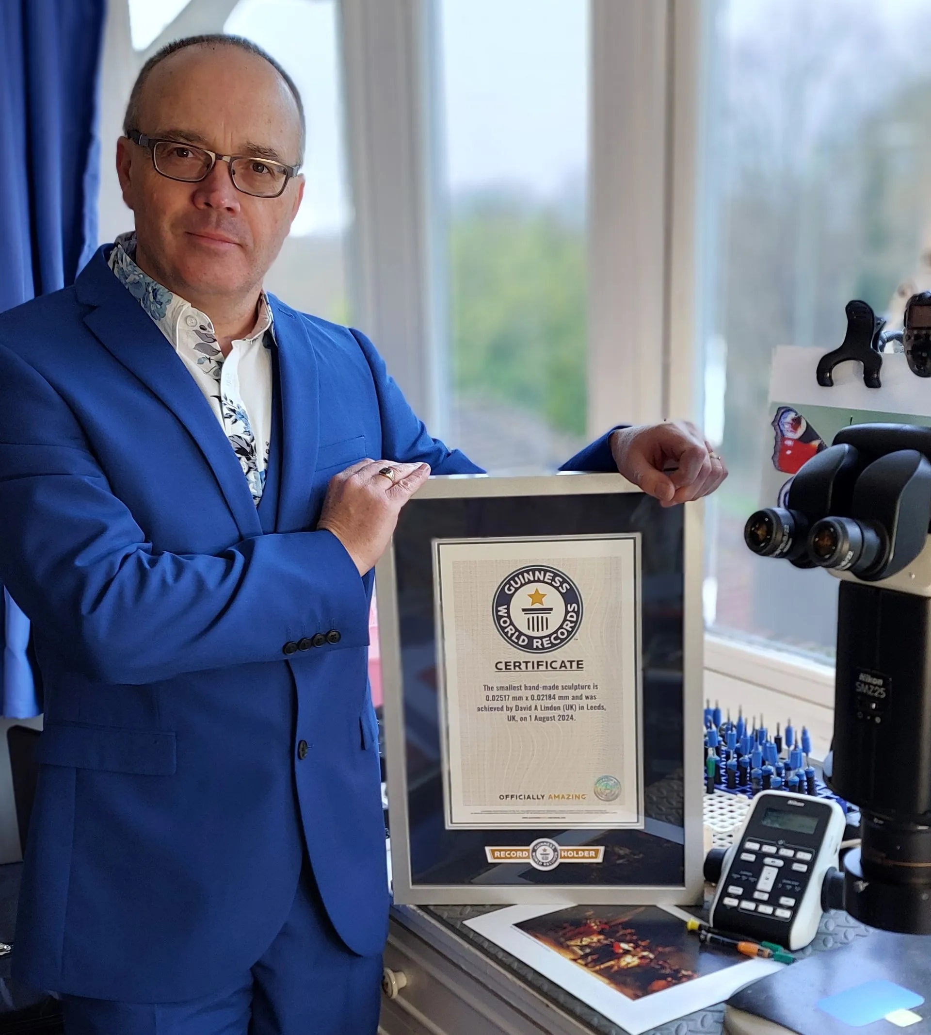 Dorset micro-artist wins world record for sculpture the size of a human ...