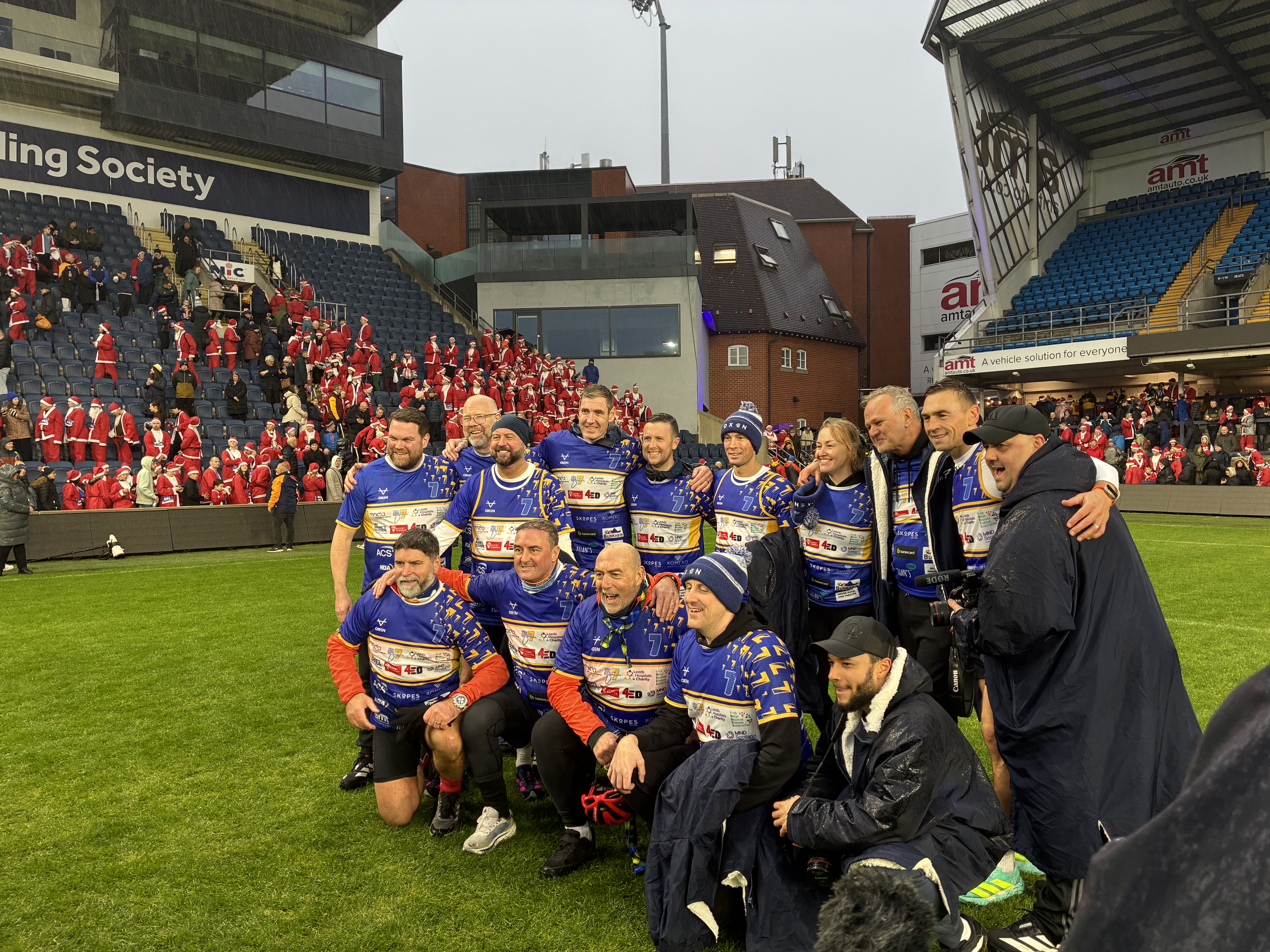 Kevin Sinfield crosses finish line at Headingley Stadium after ...