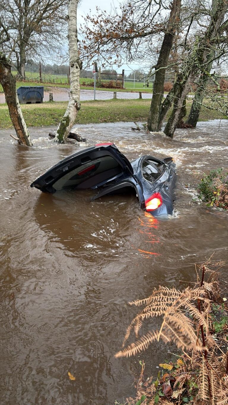 Driver rescued after car submerged in floodwater in New Forest | News ...