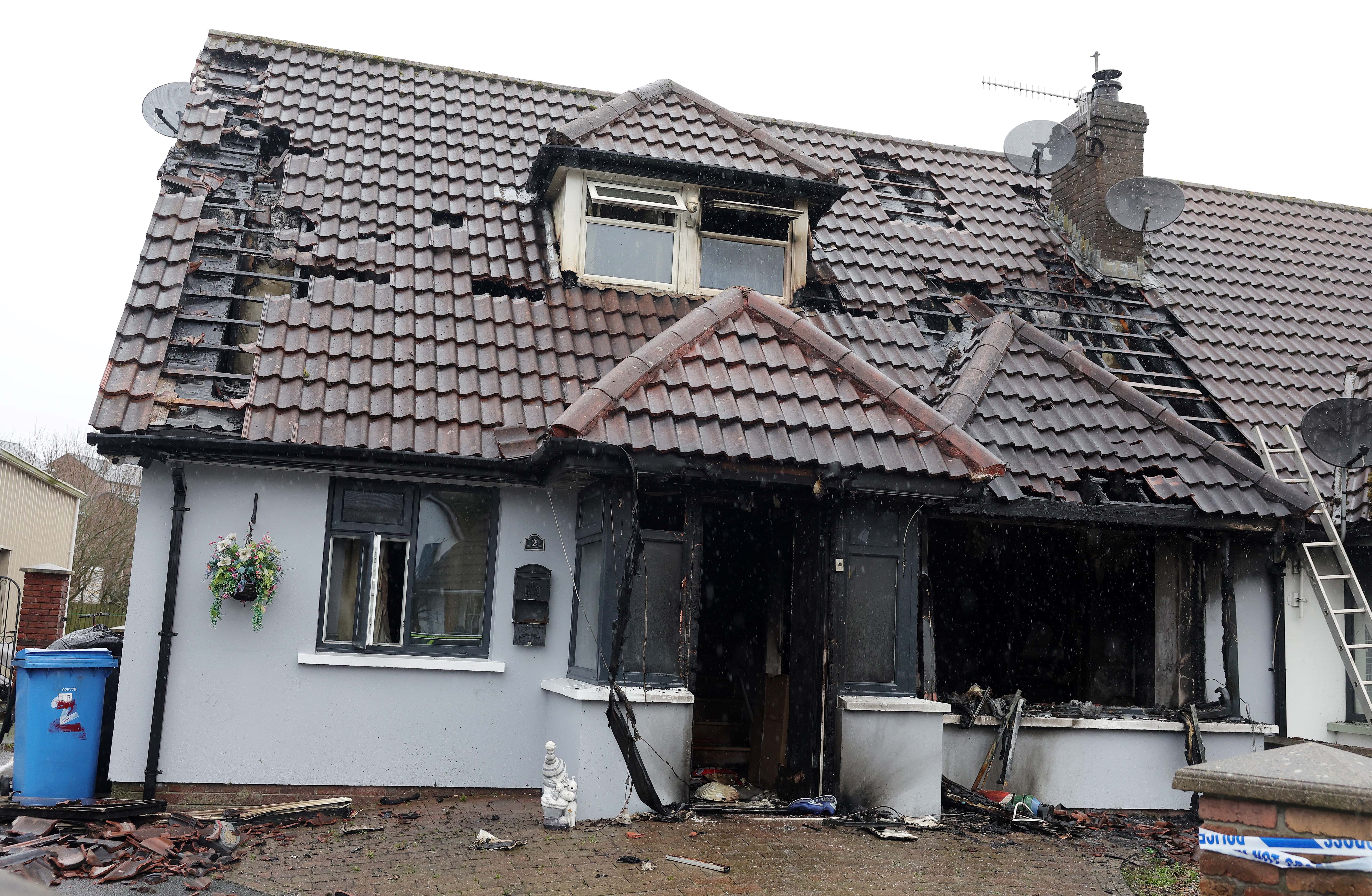 A man is injured and a pet dog killed in Newry petrol bomb attack