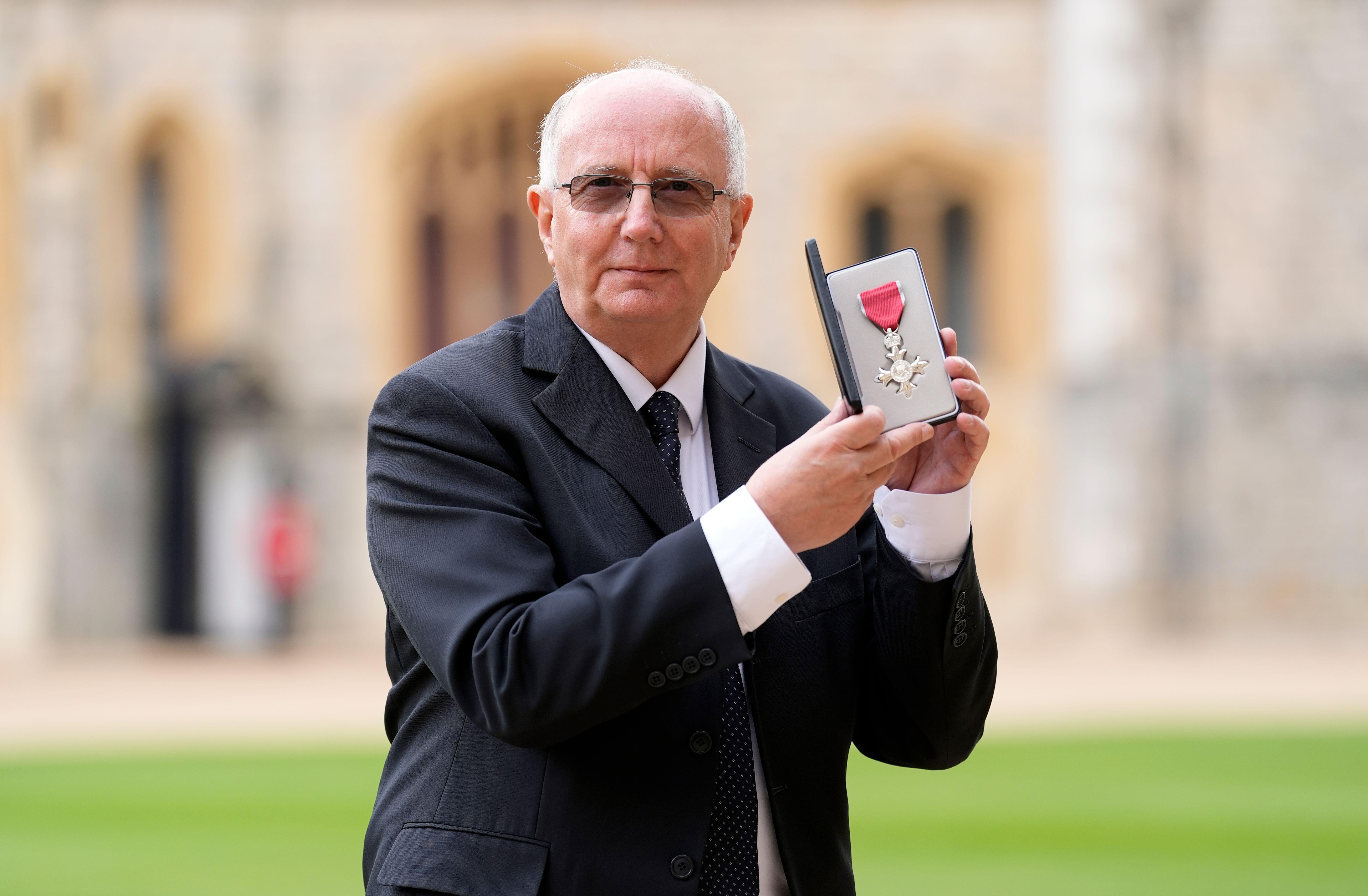 Former News Editor with over 40 years service collects MBE