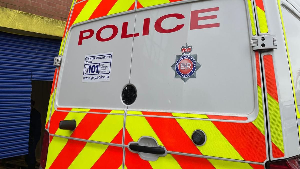 Man arrested after car 'drove directly' at officers in Bury