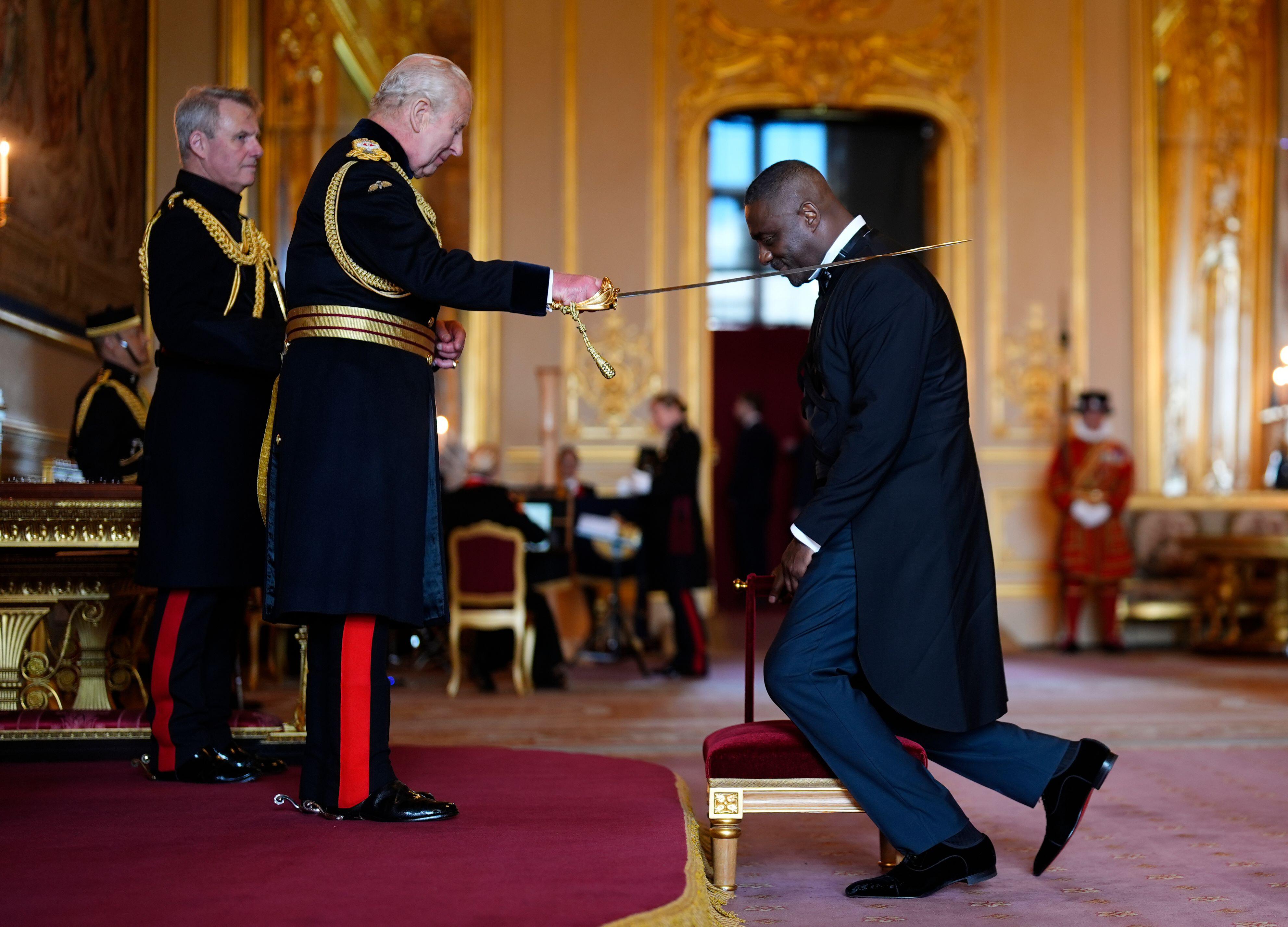 Idris Elba, Torvill and Dean all receive honours from the King