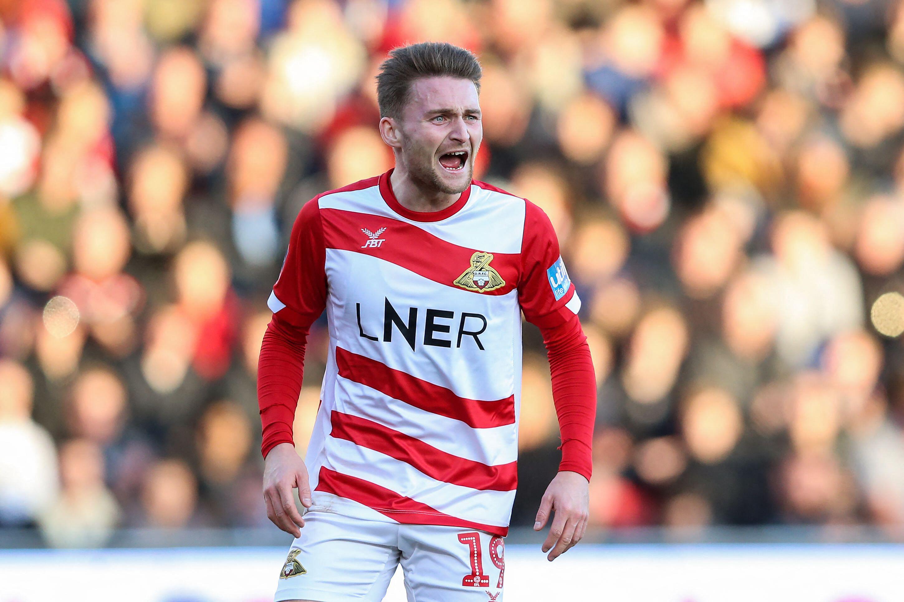 Huddersfield Town forward Alfie May rejoins Doncaster Rovers on season ...