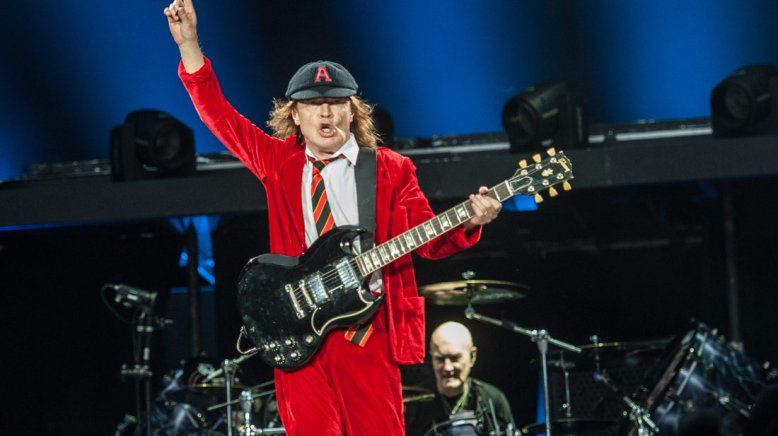 Watch Guns n' Roses perform with AC/DC's Angus Young