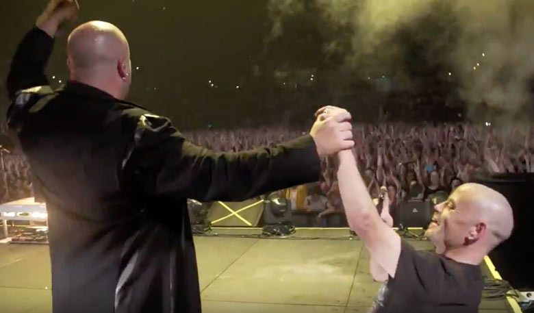 WATCH: Disturbed invite disabled fan in mosh pit on stage with them ...