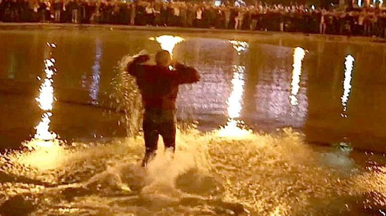 Kanye West leaps into a lake during Armenian performance | Music - KISS